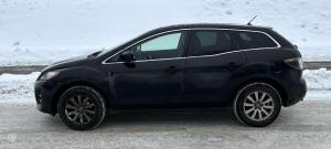 Black Mazda CX-7 2010 in Vilnius, with an engine capacity of 2.49 L and mileage of 135 thousand km for 1700 €, photo 8 on AUTOMOTO.COM.LV