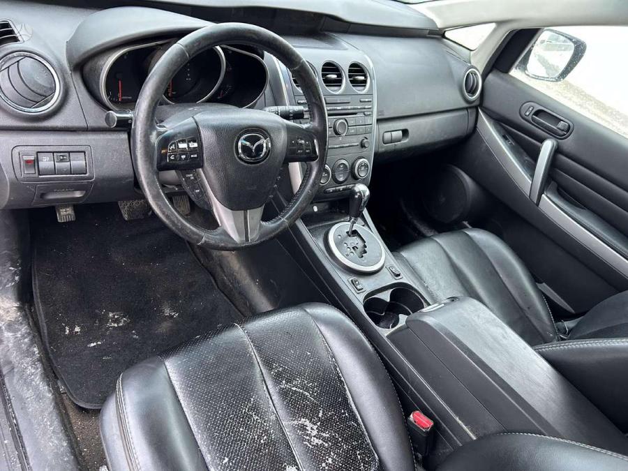 Black Mazda CX-7 2010 in Vilnius, with an engine capacity of 2.49 L and mileage of 135 thousand km for 1700 €, photo 11 on AUTOMOTO.COM.LV