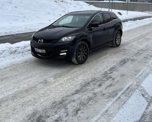 Melns Mazda CX-7 2010 Viļņa, ar dzinēja tilpumu 2.49 L un nobraukumu 135 tūkst. km par 1500 €, foto 1 vietnē AUTOMOTO.COM.LV