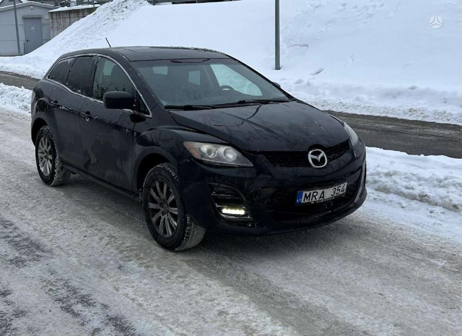 Black Mazda CX-7 2010 in Vilnius, with an engine capacity of 2.49 L and mileage of 135 thousand km for 1500 €, photo 2 on AUTOMOTO.COM.LV