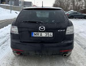Black Mazda CX-7 2010 in Vilnius, with an engine capacity of 2.49 L and mileage of 135 thousand km for 1500 €, photo 5 on AUTOMOTO.COM.LV
