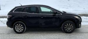 Black Mazda CX-7 2010 in Vilnius, with an engine capacity of 2.49 L and mileage of 135 thousand km for 1500 €, photo 6 on AUTOMOTO.COM.LV