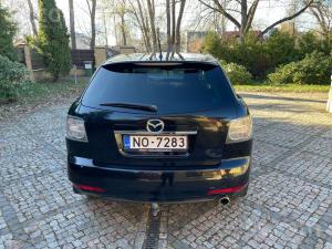 Black Mazda CX-7 2010 in Riga, with an engine capacity of 2.20 L and mileage of 287 thousand km for 4500 €, photo 4 on AUTOMOTO.COM.LV
