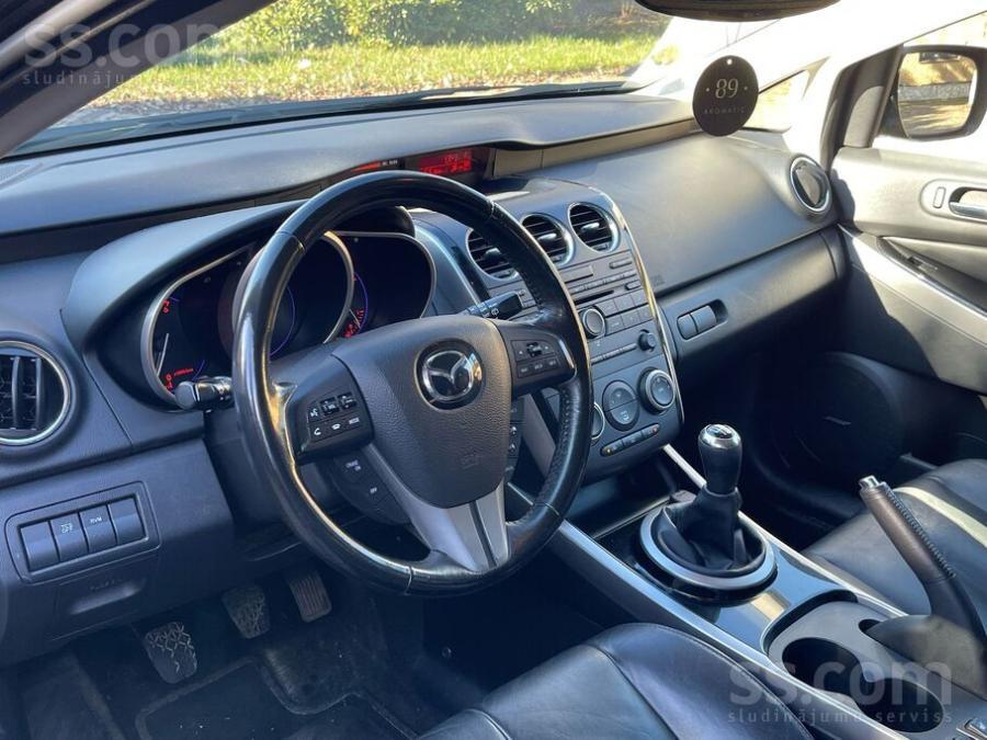 Black Mazda CX-7 2010 in Riga, with an engine capacity of 2.20 L and mileage of 287 thousand km for 4500 €, photo 5 on AUTOMOTO.COM.LV