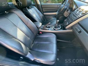 Black Mazda CX-7 2010 in Riga, with an engine capacity of 2.20 L and mileage of 287 thousand km for 4500 €, photo 9 on AUTOMOTO.COM.LV