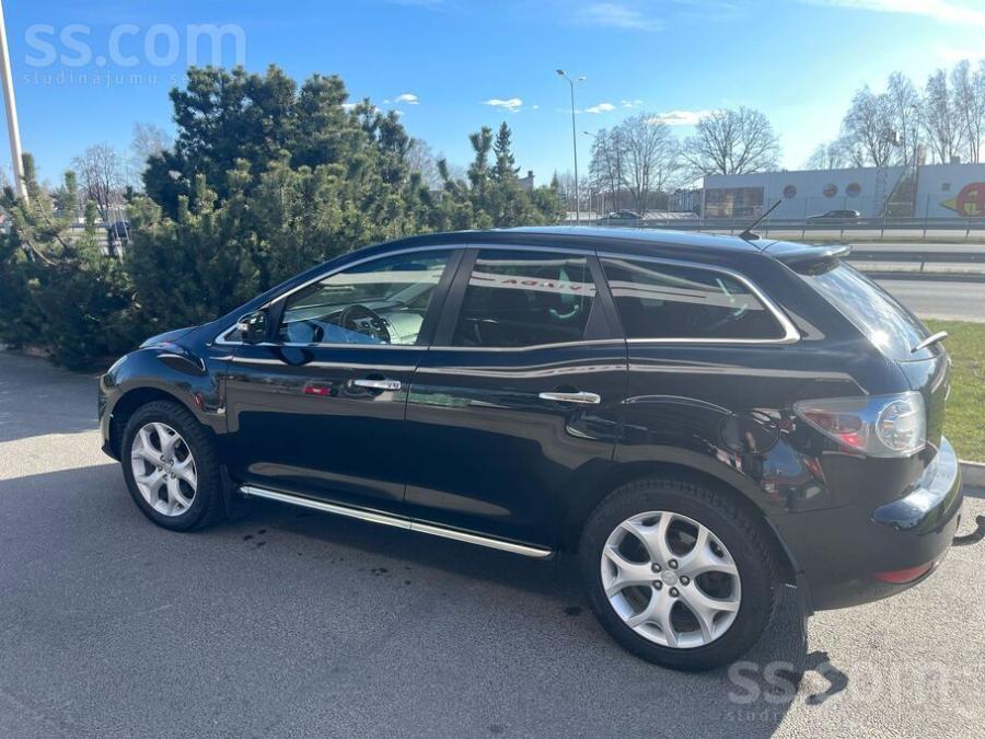 Black Mazda CX-7 2010 in Riga, with an engine capacity of 2.20 L and mileage of 287 thousand km for 4500 €, photo 11 on AUTOMOTO.COM.LV