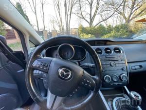 Black Mazda CX-7 2010 in Riga, with an engine capacity of 2.20 L and mileage of 287 thousand km for 4500 €, photo 13 on AUTOMOTO.COM.LV