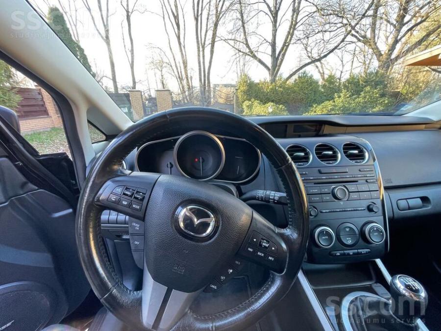 Black Mazda CX-7 2010 in Riga, with an engine capacity of 2.20 L and mileage of 287 thousand km for 4500 €, photo 13 on AUTOMOTO.COM.LV