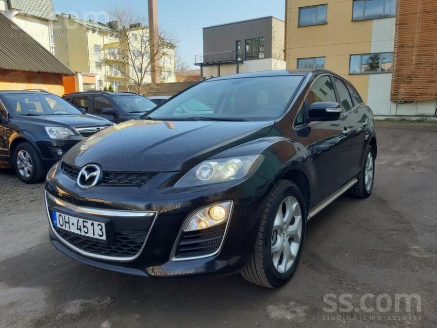 Black Mazda CX-7 2010 in Daugavpils, with an engine capacity of 2.20 L and mileage of 0 thousand km for 6850 €, photo 1 on AUTOMOTO.COM.LV