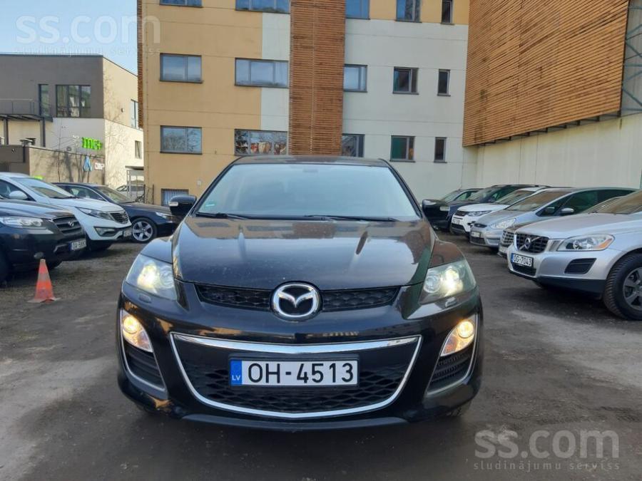 Black Mazda CX-7 2010 in Daugavpils, with an engine capacity of 2.20 L and mileage of 0 thousand km for 6850 €, photo 3 on AUTOMOTO.COM.LV