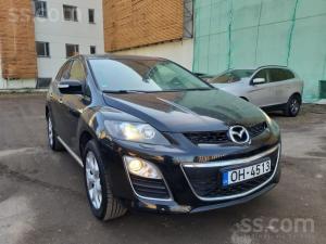 Black Mazda CX-7 2010 in Daugavpils, with an engine capacity of 2.20 L and mileage of 0 thousand km for 6850 €, photo 4 on AUTOMOTO.COM.LV