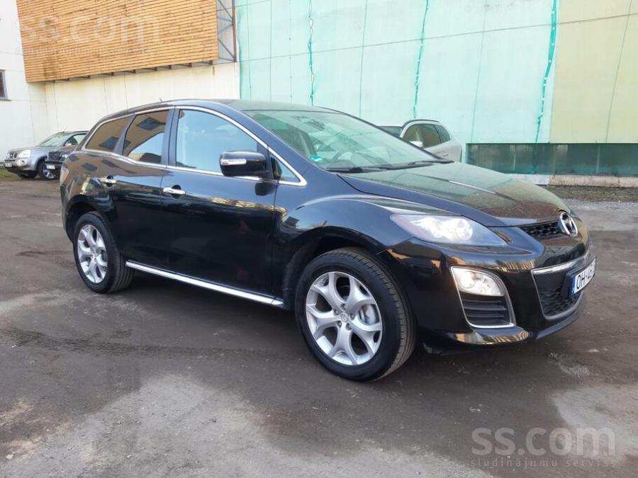 Black Mazda CX-7 2010 in Daugavpils, with an engine capacity of 2.20 L and mileage of 0 thousand km for 6850 €, photo 5 on AUTOMOTO.COM.LV