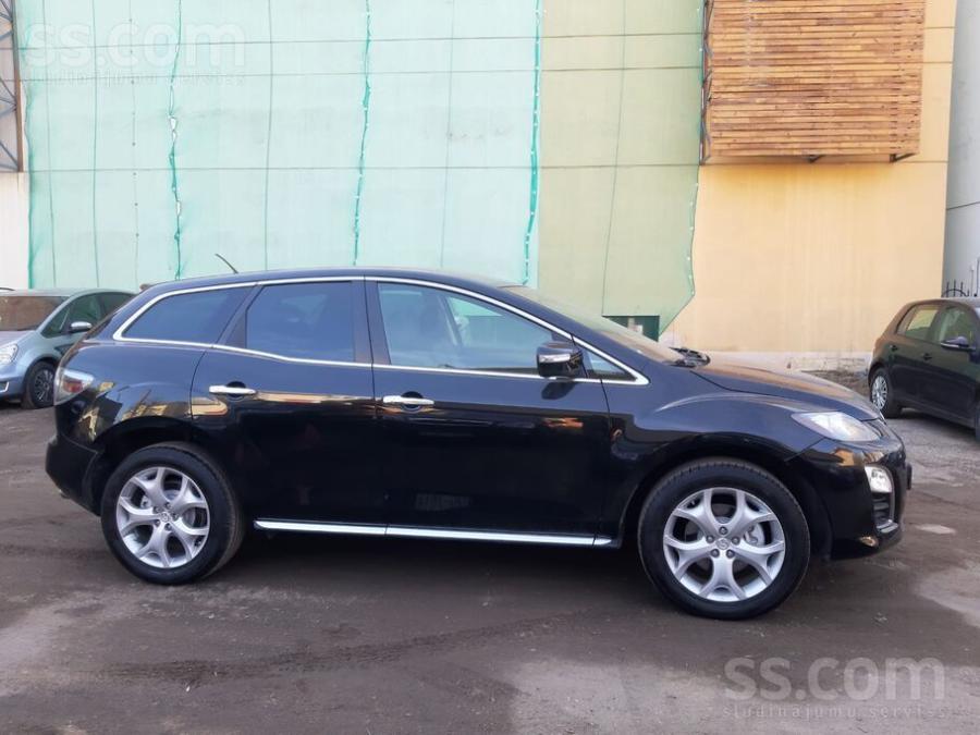 Black Mazda CX-7 2010 in Daugavpils, with an engine capacity of 2.20 L and mileage of 0 thousand km for 6850 €, photo 6 on AUTOMOTO.COM.LV