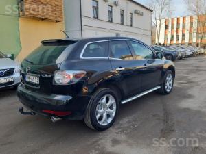 Black Mazda CX-7 2010 in Daugavpils, with an engine capacity of 2.20 L and mileage of 0 thousand km for 6850 €, photo 7 on AUTOMOTO.COM.LV
