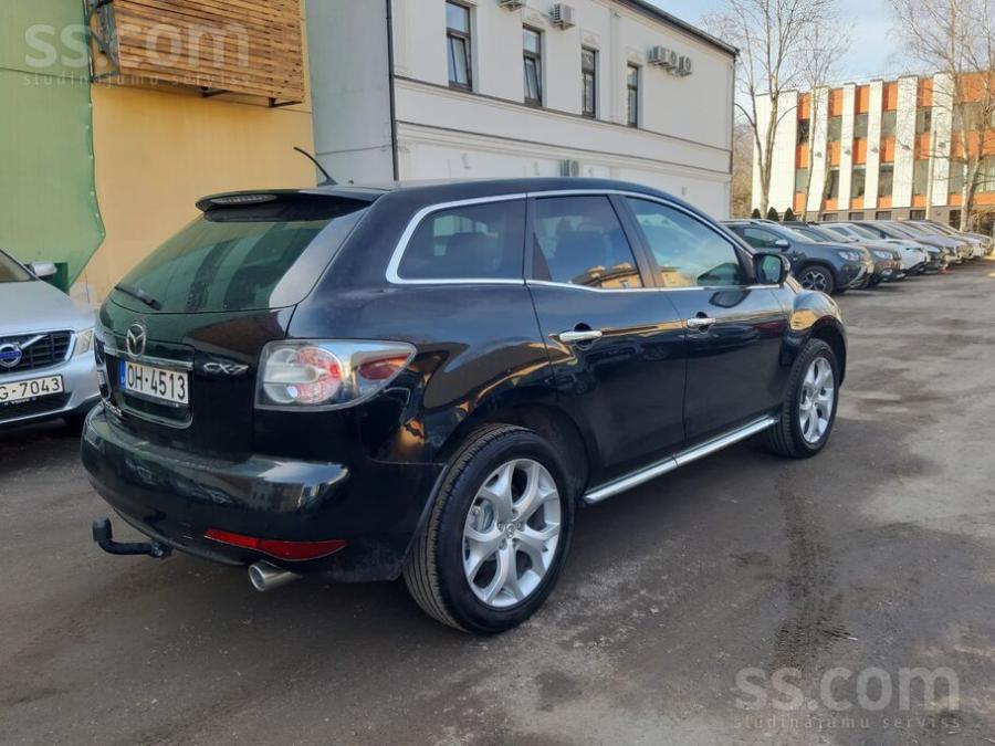 Black Mazda CX-7 2010 in Daugavpils, with an engine capacity of 2.20 L and mileage of 0 thousand km for 6850 €, photo 7 on AUTOMOTO.COM.LV