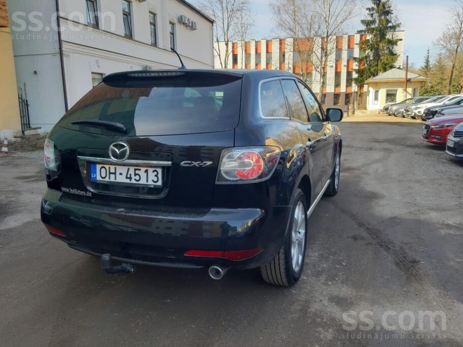 Black Mazda CX-7 2010 in Daugavpils, with an engine capacity of 2.20 L and mileage of 0 thousand km for 6850 €, photo 8 on AUTOMOTO.COM.LV