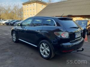 Black Mazda CX-7 2010 in Daugavpils, with an engine capacity of 2.20 L and mileage of 0 thousand km for 6850 €, photo 11 on AUTOMOTO.COM.LV