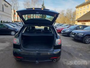 Black Mazda CX-7 2010 in Daugavpils, with an engine capacity of 2.20 L and mileage of 0 thousand km for 6850 €, photo 28 on AUTOMOTO.COM.LV