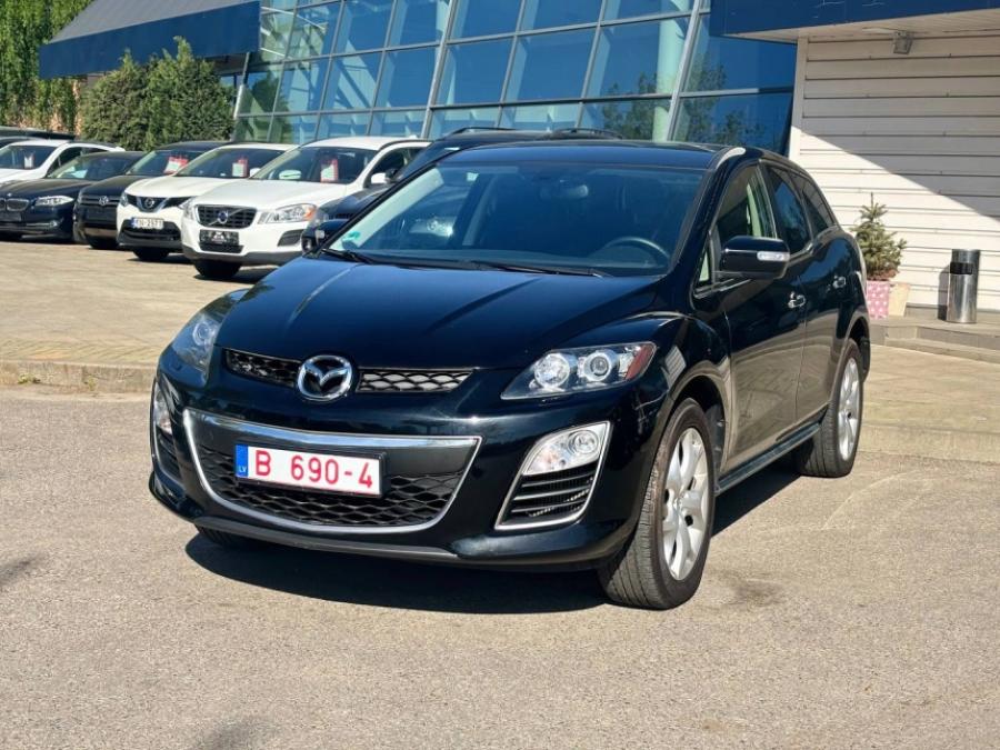 Черный Мазда СХ-7 2010 в Рига, объемом двигателя 2.20 л и пробегом 163 тыс. км за 7799 €, фото 1 на AUTOMOTO.COM.LV