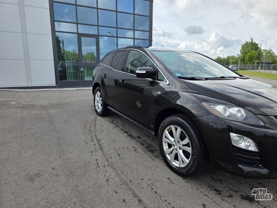 Black Mazda CX-7 2010 in Kretinga, with an engine capacity of 2.20 L and mileage of 266 thousand km for 3100 €, photo 3 on AUTOMOTO.COM.LV