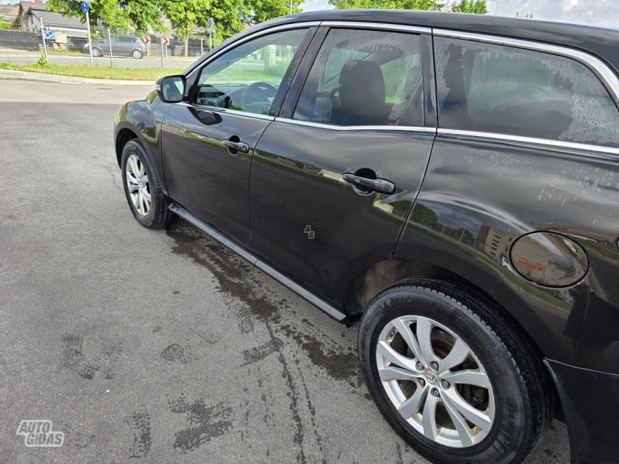 Black Mazda CX-7 2010 in Kretinga, with an engine capacity of 2.20 L and mileage of 266 thousand km for 3100 €, photo 7 on AUTOMOTO.COM.LV