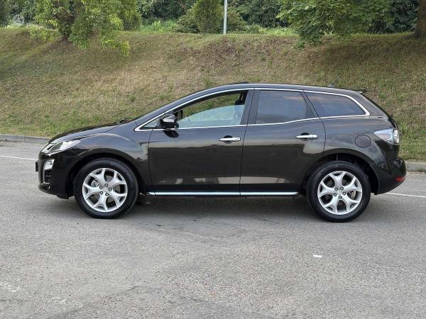 Black Mazda CX-7 2010 in Jonava, with an engine capacity of 2.18 L and mileage of 281 thousand km for 4250 €, photo 5 on AUTOMOTO.COM.LV