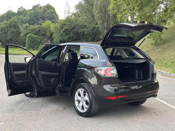 Black Mazda CX-7 2010 in Jonava, with an engine capacity of 2.18 L and mileage of 281 thousand km for 4250 €, photo 8 on AUTOMOTO.COM.LV