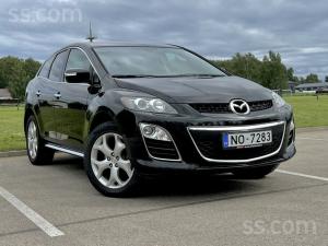 Melns Mazda CX-7 2010 Cēsis, ar dzinēja tilpumu 2.20 L un nobraukumu 293 tūkst. km par 4500 €, foto  vietnē AUTOMOTO.COM.LV