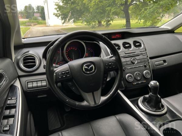 Melns Mazda CX-7 2010 Cēsis, ar dzinēja tilpumu 2.20 L un nobraukumu 293 tūkst. km par 4500 €, foto 7 vietnē AUTOMOTO.COM.LV