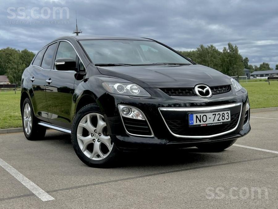 Melns Mazda CX-7 2010 Cēsis, ar dzinēja tilpumu 2.20 L un nobraukumu 293 tūkst. km par 4500 €, foto 1 vietnē AUTOMOTO.COM.LV