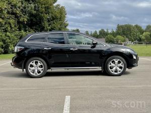 Melns Mazda CX-7 2010 Cēsis, ar dzinēja tilpumu 2.20 L un nobraukumu 293 tūkst. km par 4500 €, foto 6 vietnē AUTOMOTO.COM.LV