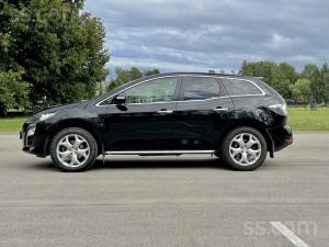 Melns Mazda CX-7 2010 Cēsis, ar dzinēja tilpumu 2.20 L un nobraukumu 293 tūkst. km par 4500 €, foto 7 vietnē AUTOMOTO.COM.LV