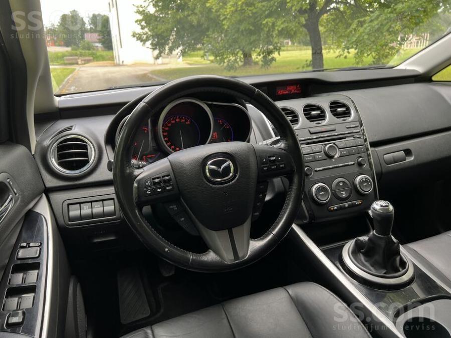 Melns Mazda CX-7 2010 Cēsis, ar dzinēja tilpumu 2.20 L un nobraukumu 293 tūkst. km par 4500 €, foto 8 vietnē AUTOMOTO.COM.LV