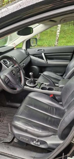Black Mazda CX-7 2010 in Vilnius, with an engine capacity of 2.20 L and mileage of 0 thousand km for 2999 €, photo 9 on AUTOMOTO.COM.LV