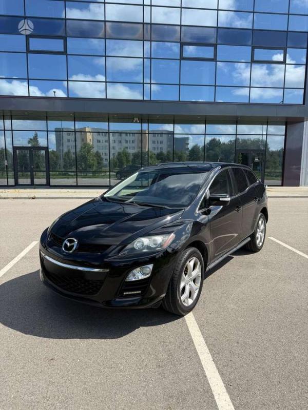 Black Mazda CX-7 2010 in Klaipeda, with an engine capacity of 2.18 L and mileage of 373 thousand km for 2700 €, photo 1 on AUTOMOTO.COM.LV