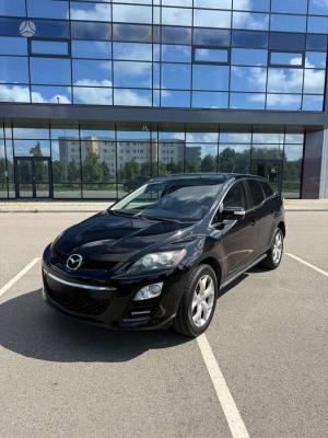 Melns Mazda CX-7 2010 Klaipėda, ar dzinēja tilpumu 2.18 L un nobraukumu 373 tūkst. km par 2700 €, foto  vietnē AUTOMOTO.COM.LV