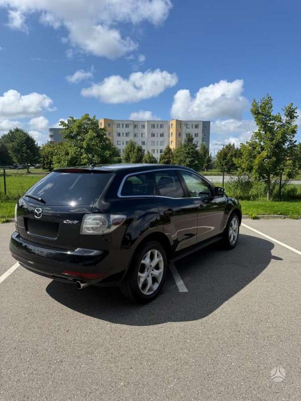 Black Mazda CX-7 2010 in Klaipeda, with an engine capacity of 2.18 L and mileage of 373 thousand km for 2700 €, photo 3 on AUTOMOTO.COM.LV