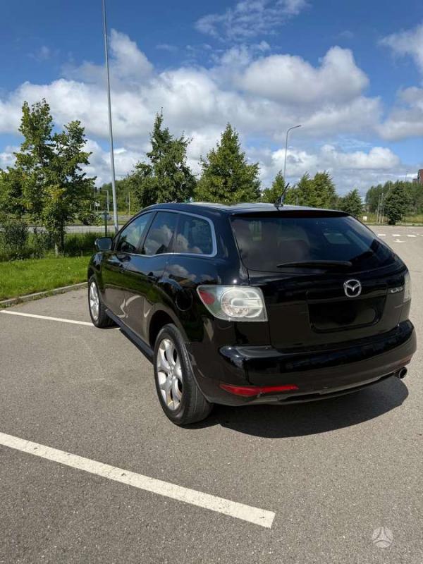 Black Mazda CX-7 2010 in Klaipeda, with an engine capacity of 2.18 L and mileage of 373 thousand km for 2700 €, photo 4 on AUTOMOTO.COM.LV