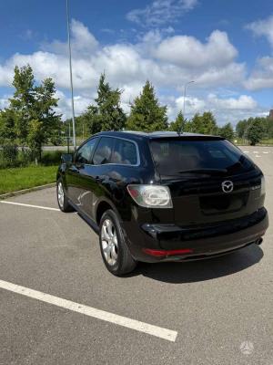Melns Mazda CX-7 2010 Klaipėda, ar dzinēja tilpumu 2.18 L un nobraukumu 373 tūkst. km par 2700 €, foto 5 vietnē AUTOMOTO.COM.LV