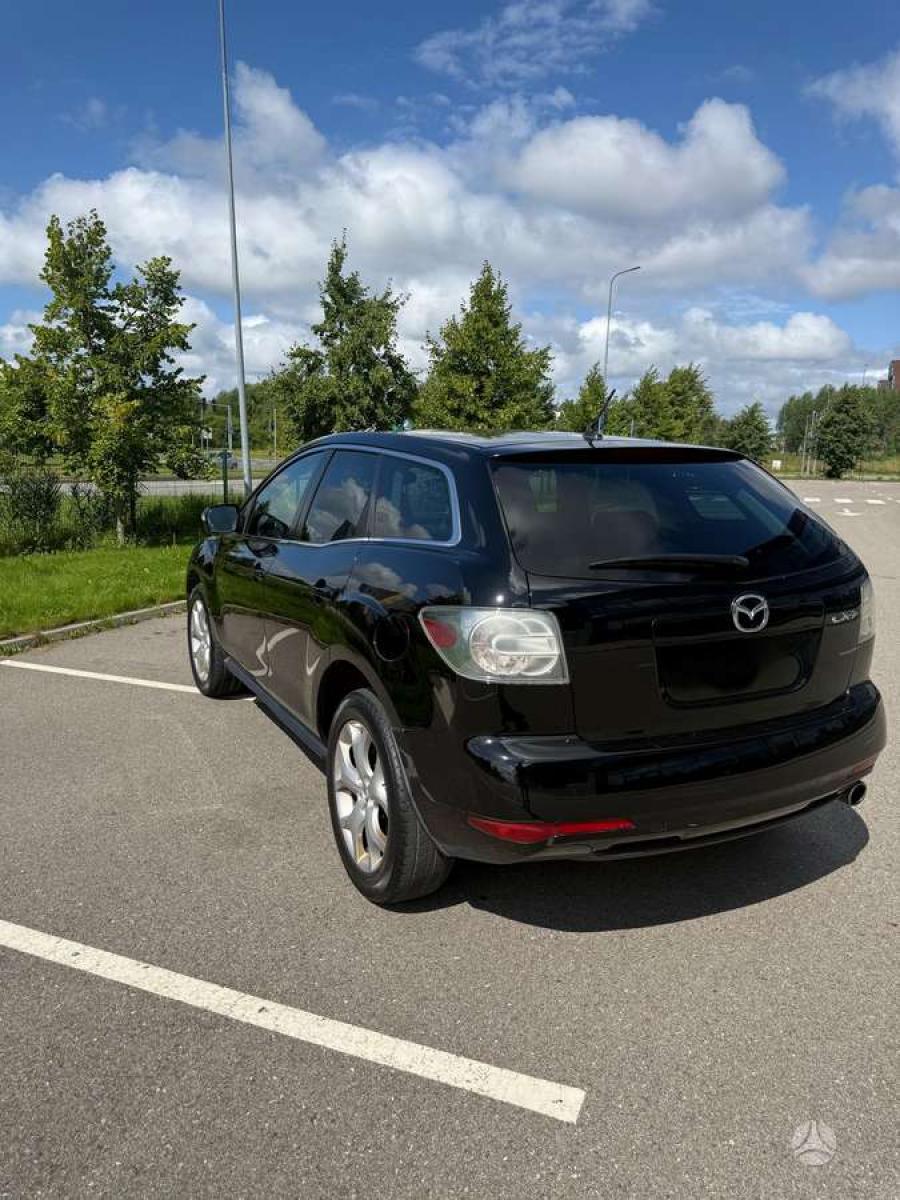 Melns Mazda CX-7 2010 Klaipėda, ar dzinēja tilpumu 2.18 L un nobraukumu 373 tūkst. km par 2700 €, foto 5 vietnē AUTOMOTO.COM.LV