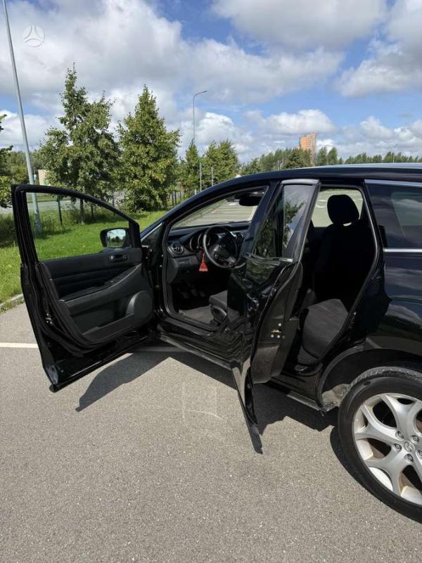 Black Mazda CX-7 2010 in Klaipeda, with an engine capacity of 2.18 L and mileage of 373 thousand km for 2700 €, photo 7 on AUTOMOTO.COM.LV