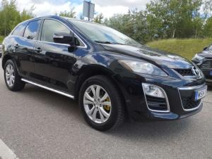 Black Mazda CX-7 2010 in Vilnius, with an engine capacity of 2.20 L and mileage of 192 thousand km for 2999 €, photo 3 on AUTOMOTO.COM.LV