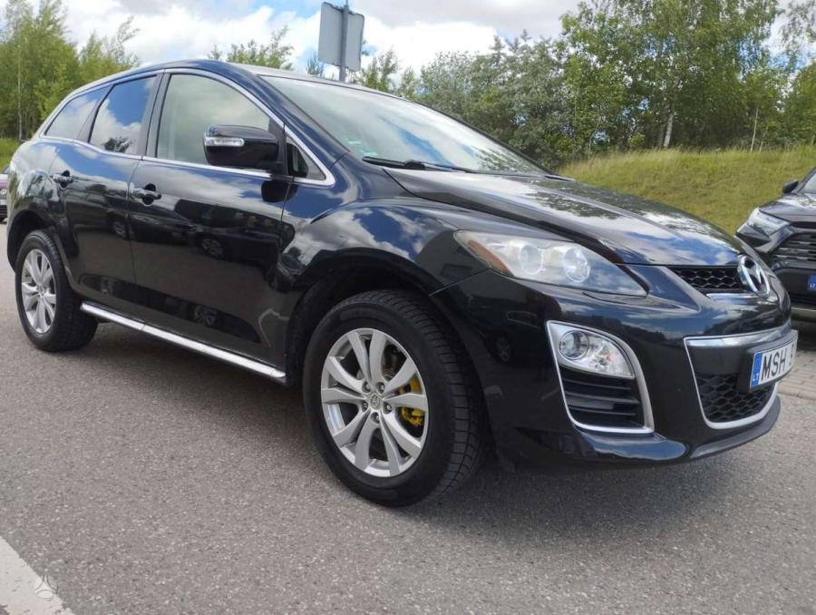Black Mazda CX-7 2010 in Vilnius, with an engine capacity of 2.20 L and mileage of 192 thousand km for 2999 €, photo 3 on AUTOMOTO.COM.LV