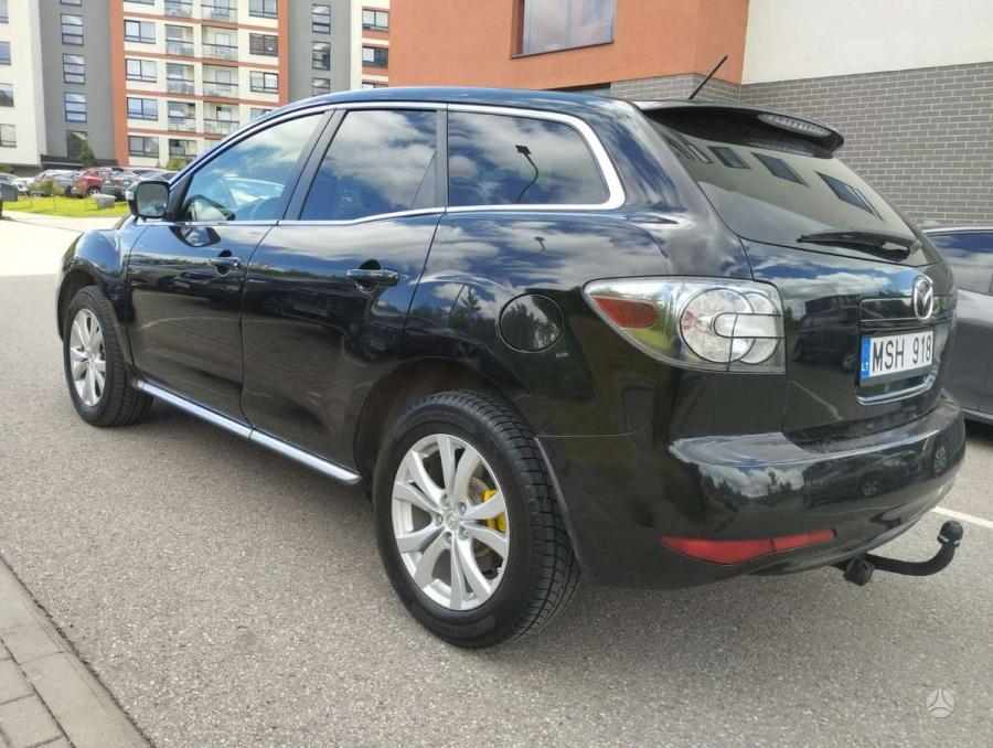 Black Mazda CX-7 2010 in Vilnius, with an engine capacity of 2.20 L and mileage of 192 thousand km for 2999 €, photo 6 on AUTOMOTO.COM.LV
