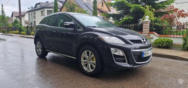 Black Mazda CX-7 2010 in Vilnius, with an engine capacity of 2.18 L and mileage of 192 thousand km for 2800 €, photo 3 on AUTOMOTO.COM.LV