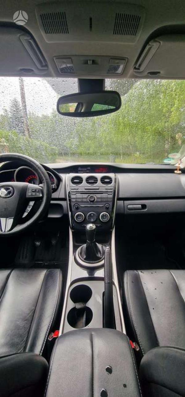 Black Mazda CX-7 2010 in Vilnius, with an engine capacity of 2.18 L and mileage of 192 thousand km for 2800 €, photo 7 on AUTOMOTO.COM.LV