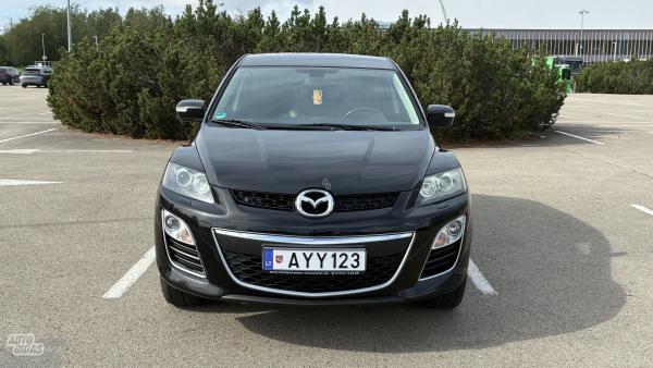 Black Mazda CX-7 2010 in Siauliai, with an engine capacity of 2.20 L and mileage of 214 thousand km for 3450 €, photo 3 on AUTOMOTO.COM.LV