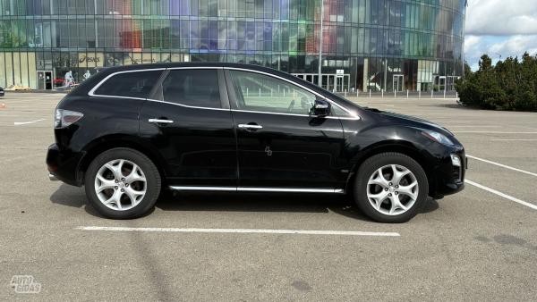 Black Mazda CX-7 2010 in Siauliai, with an engine capacity of 2.20 L and mileage of 214 thousand km for 3450 €, photo 4 on AUTOMOTO.COM.LV