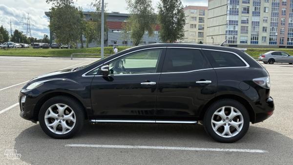 Black Mazda CX-7 2010 in Siauliai, with an engine capacity of 2.20 L and mileage of 214 thousand km for 3450 €, photo 7 on AUTOMOTO.COM.LV