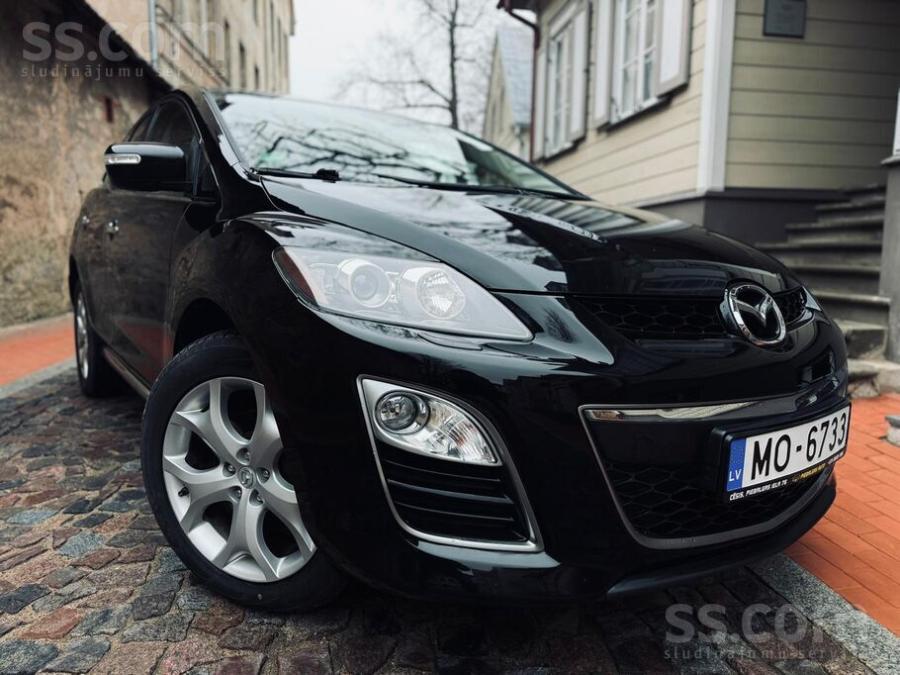 Black Mazda CX-7 2011 in Cesis, with an engine capacity of 2.20 L and mileage of 0 thousand km for 5600 €, photo 1 on AUTOMOTO.COM.LV